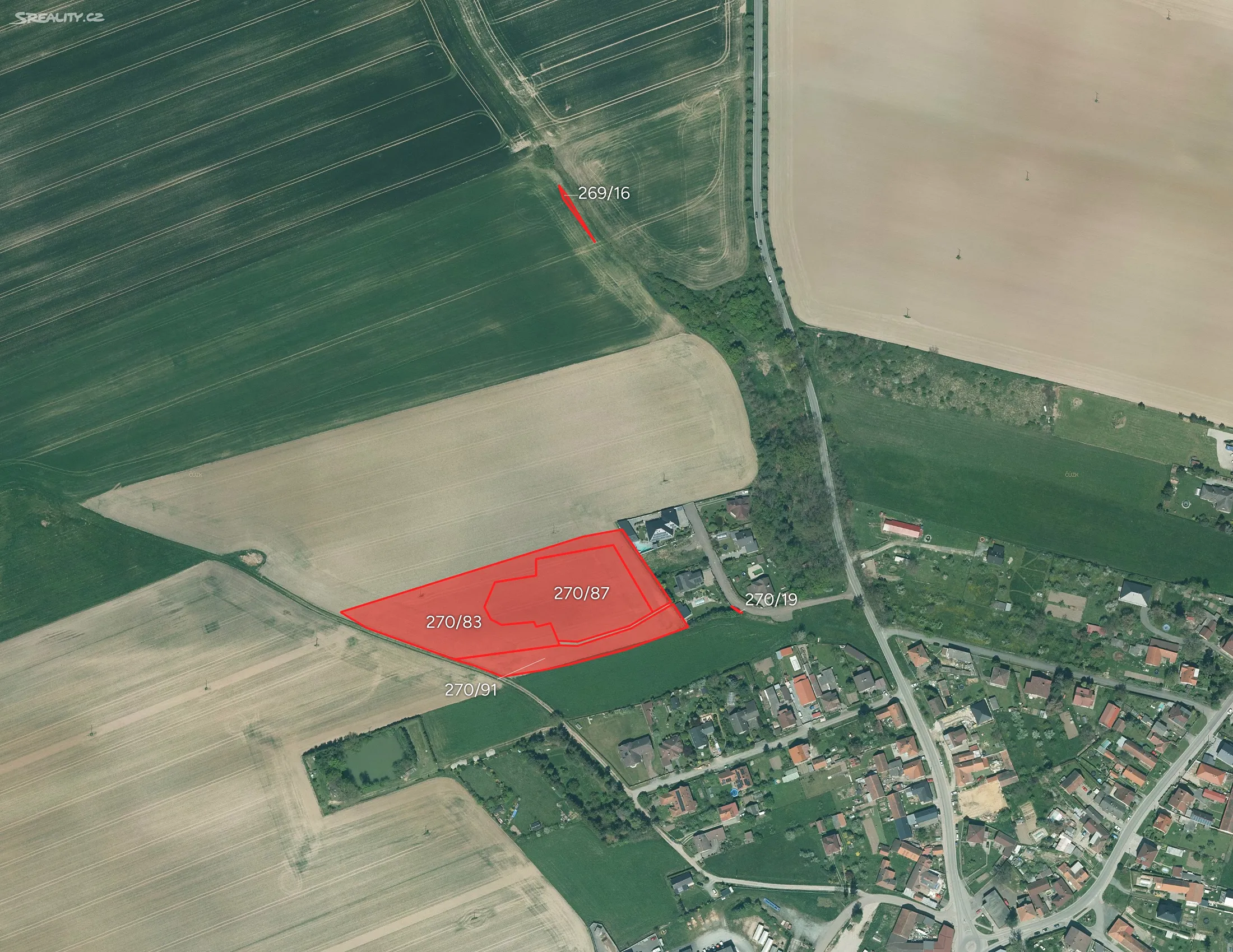 Prodej podílu 1/2 pole 6943 m², Útušice • Sreality.cz